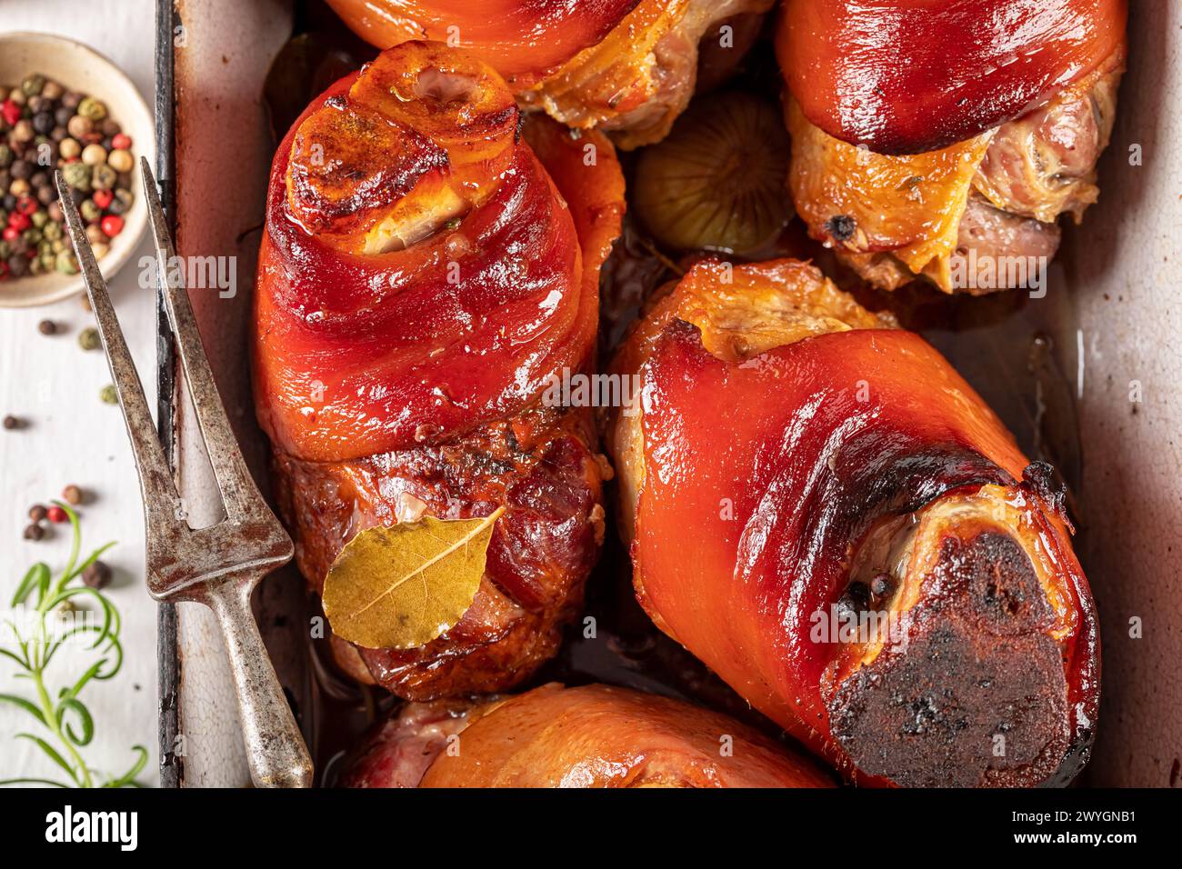 Roasted and homemade Schweinshaxe with garlic and spices. Baked ham ...