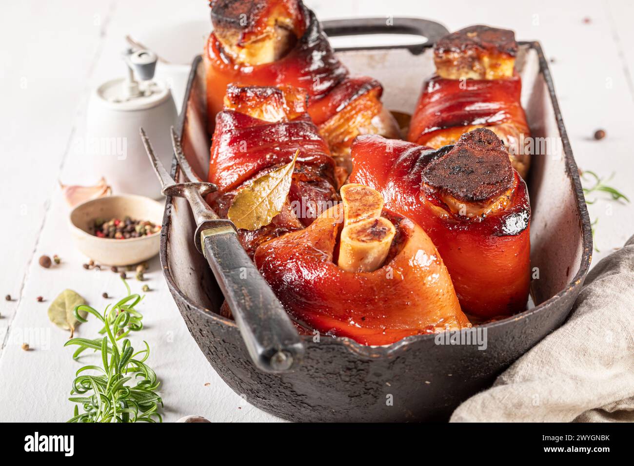 Hot and cripsy ham hock baked in casserole. Schweinshaxe with ...