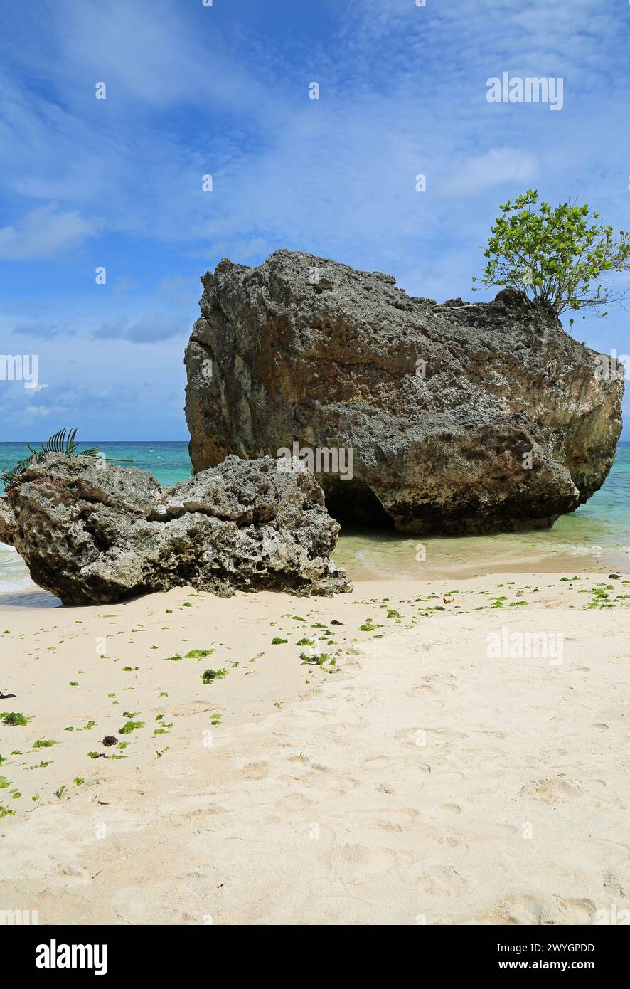 Rocks in Padang Padang Beach vertical - Bali, Indonesia Stock Photo - Alamy