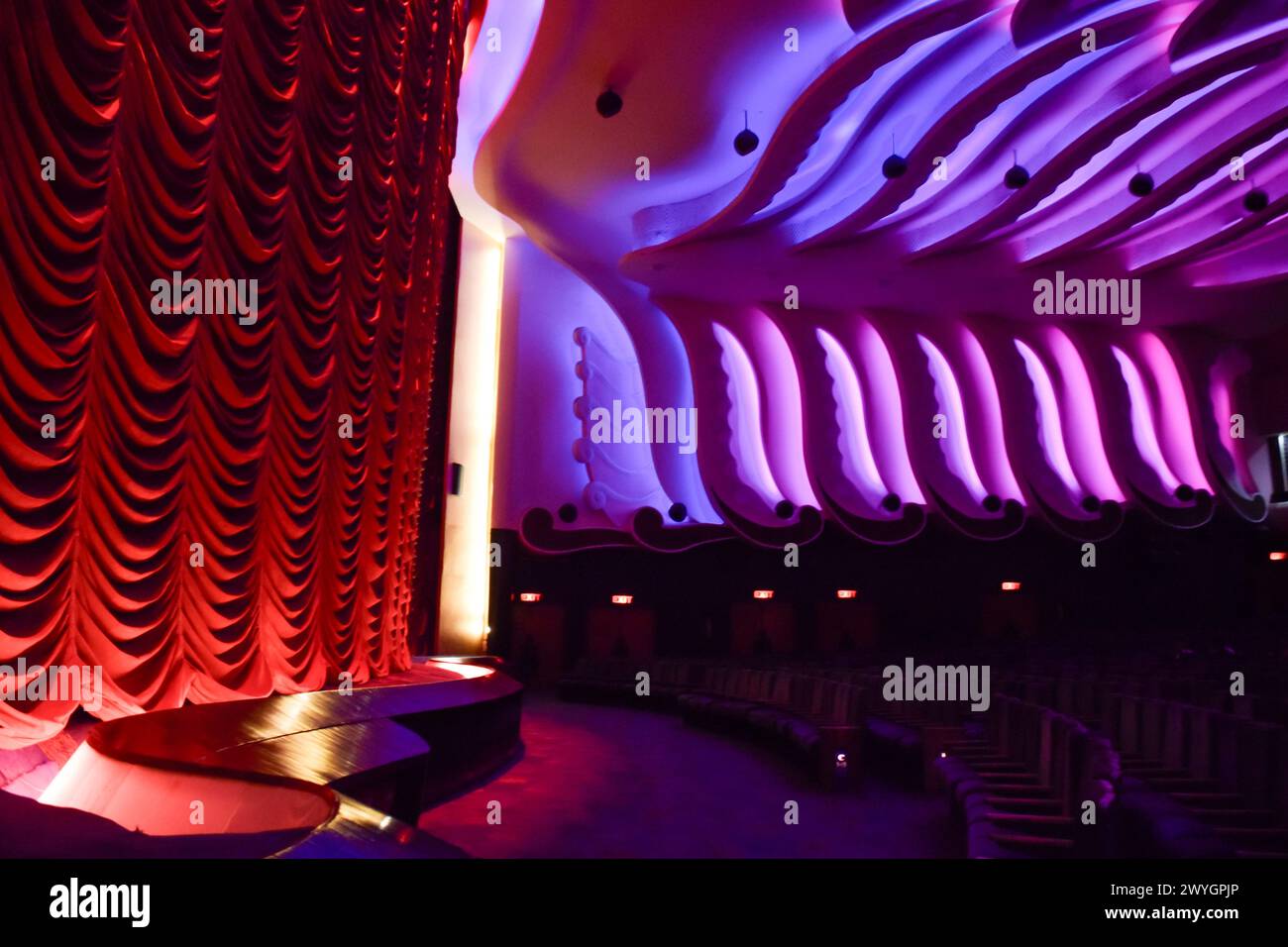Raj Mandir Theater in Jaipur with illuminated red velvet looms with ...