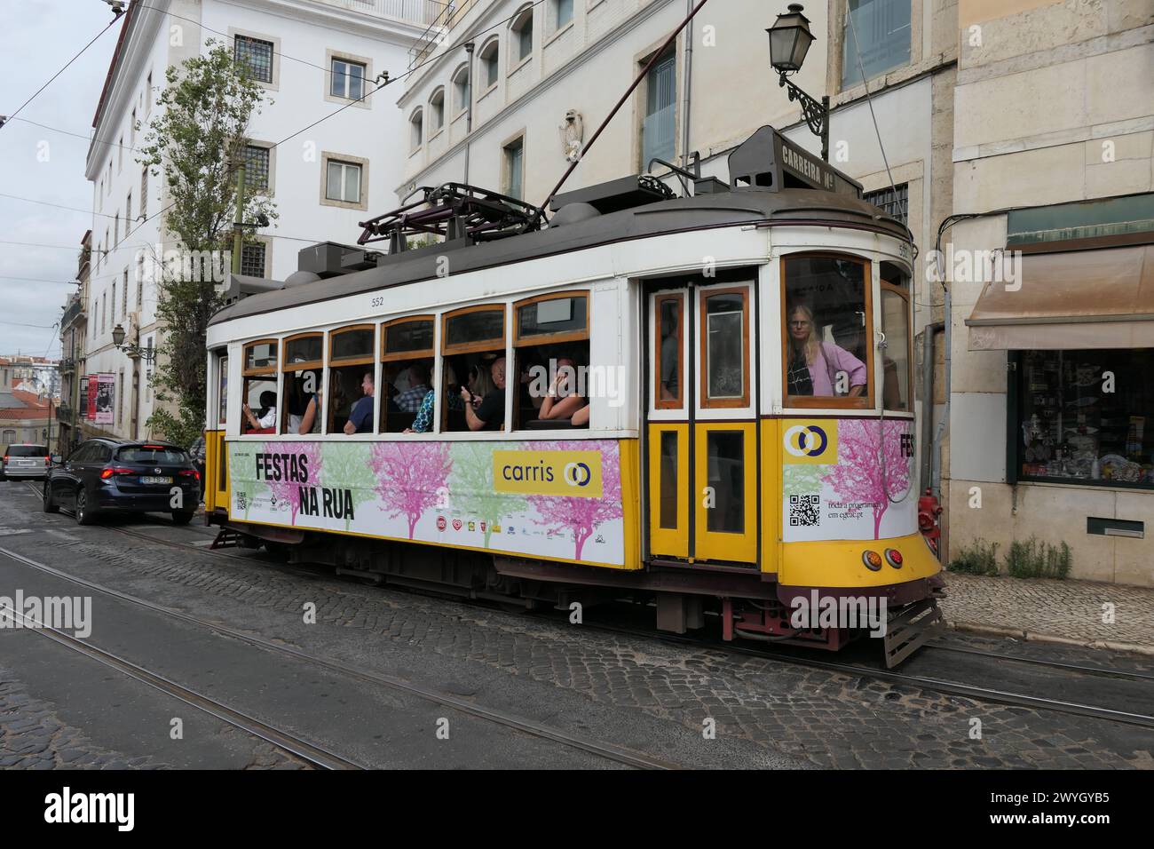 Famous Yellow Trolley runs through the oldest neighborhoods, Lisbon ...
