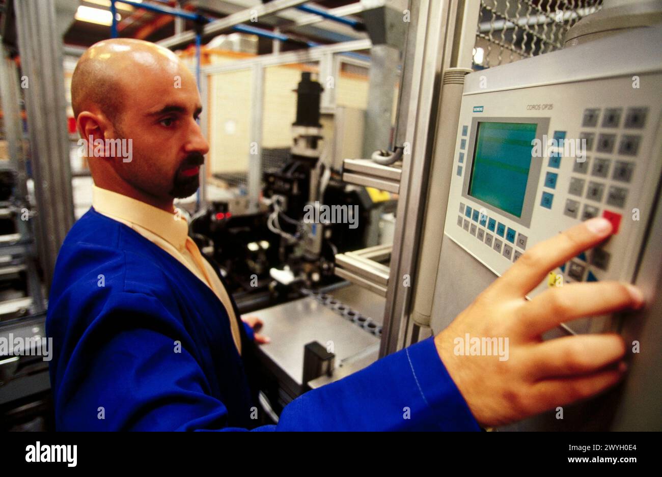 Automotive industry. Car parts manufacturing. Assembly line control ...