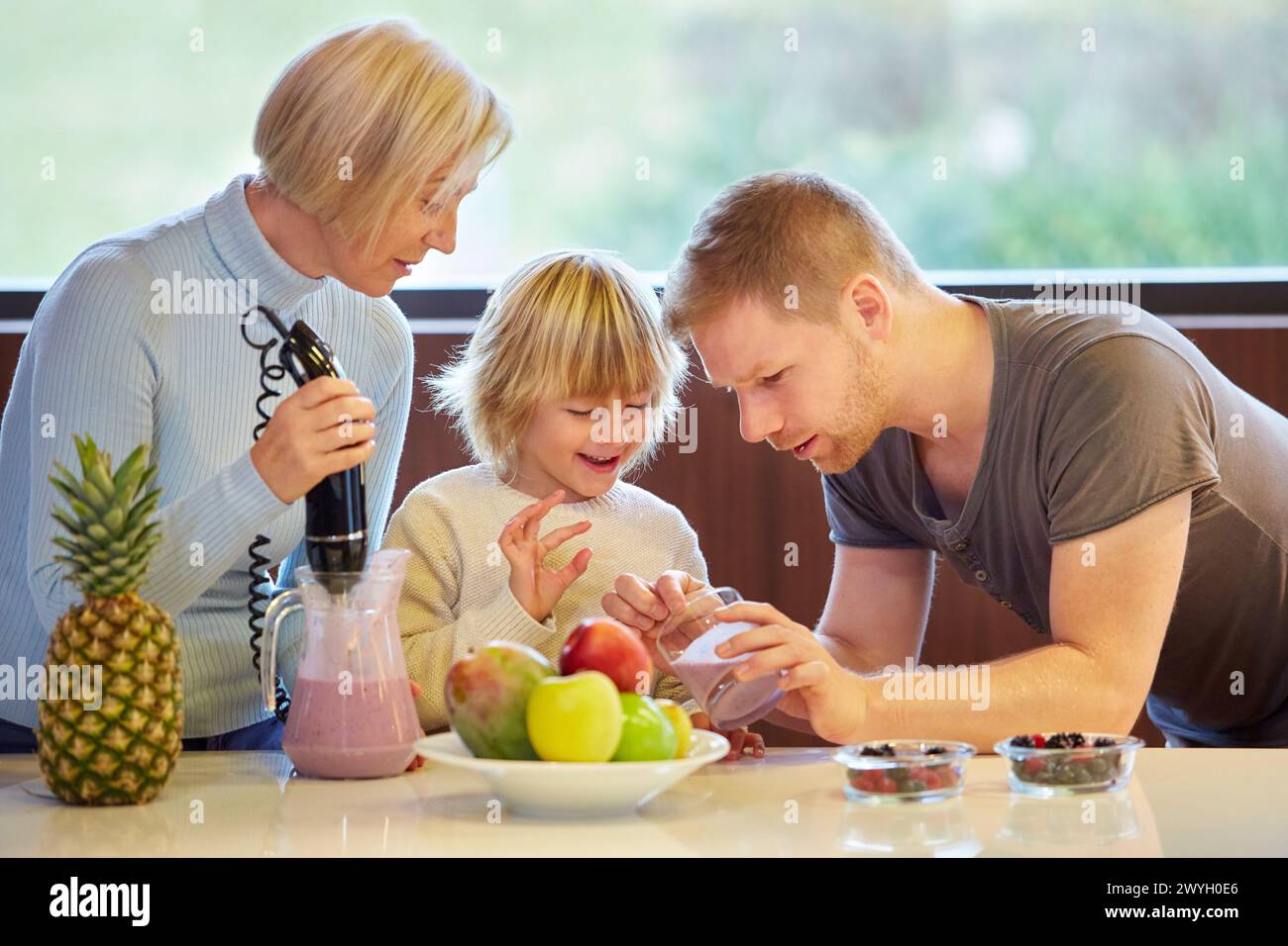 Family in the kitchen. Three generations. Healthy eating. Healthy ...