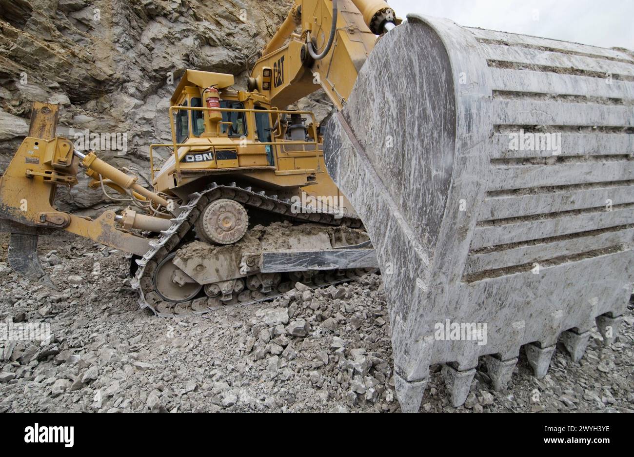 Extracting raw material from quarry for cement manufacturing Stock ...