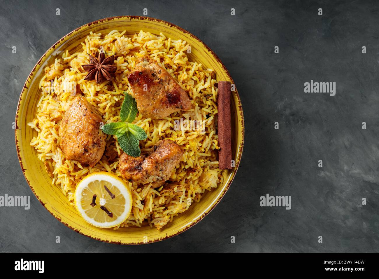 Indian Traditional Chicken Biryani Rice in Plate on Dark Background ...