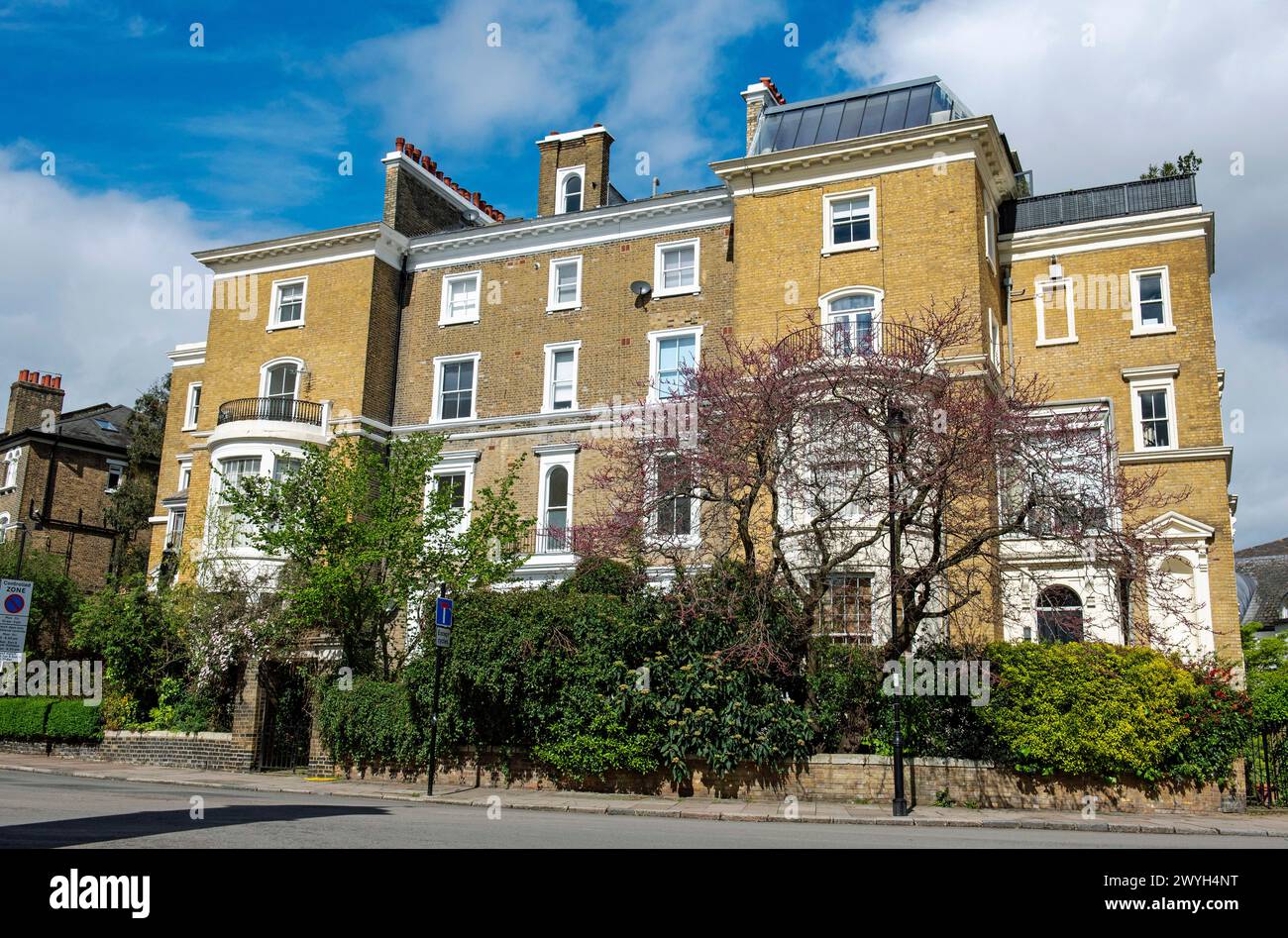 Large four story brick built Victorian house on corner at the top of ...