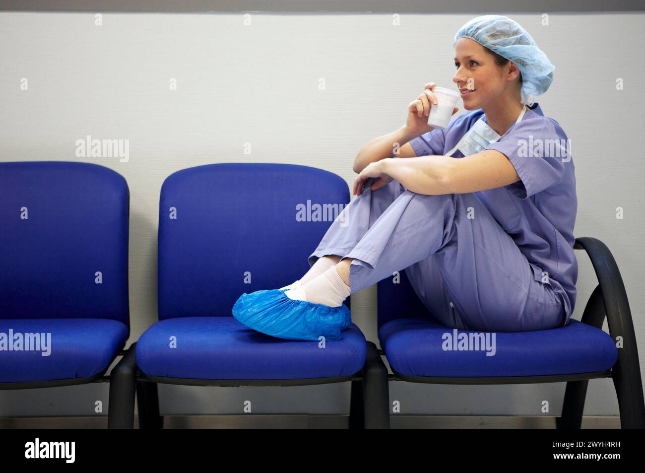 Surgeon taking a coffee in break room, surgical block. Hospital ...