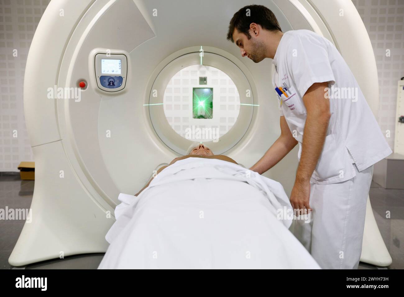 TomoTherapy, Hi-Art, Type of radiation therapy in which the radiation ...