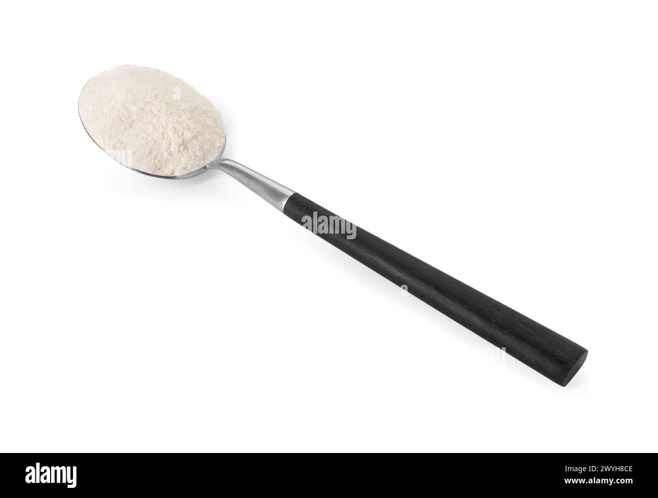 Baking powder in spoon isolated on white Stock Photo - Alamy