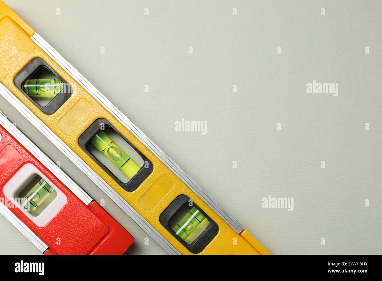 Building levels on beige background, top view. Space for text Stock ...