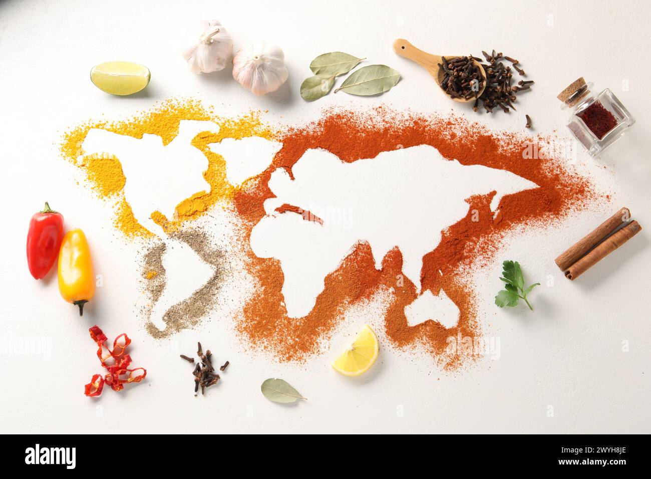 World map of different spices and products on white textured table ...