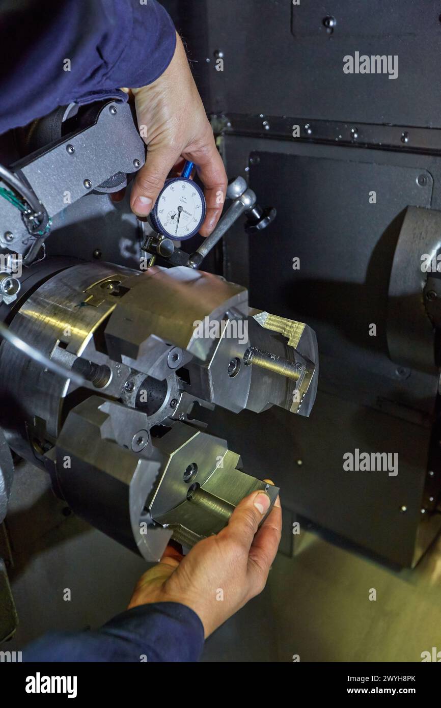 Tuning mooring. Checking with dial indicator. Automated CNC lathe ...
