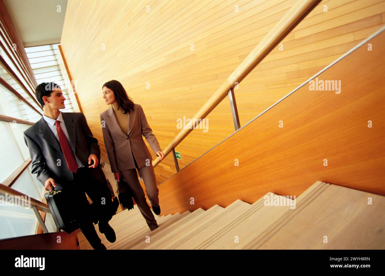Business women going up stairs hi-res stock photography and images - Alamy