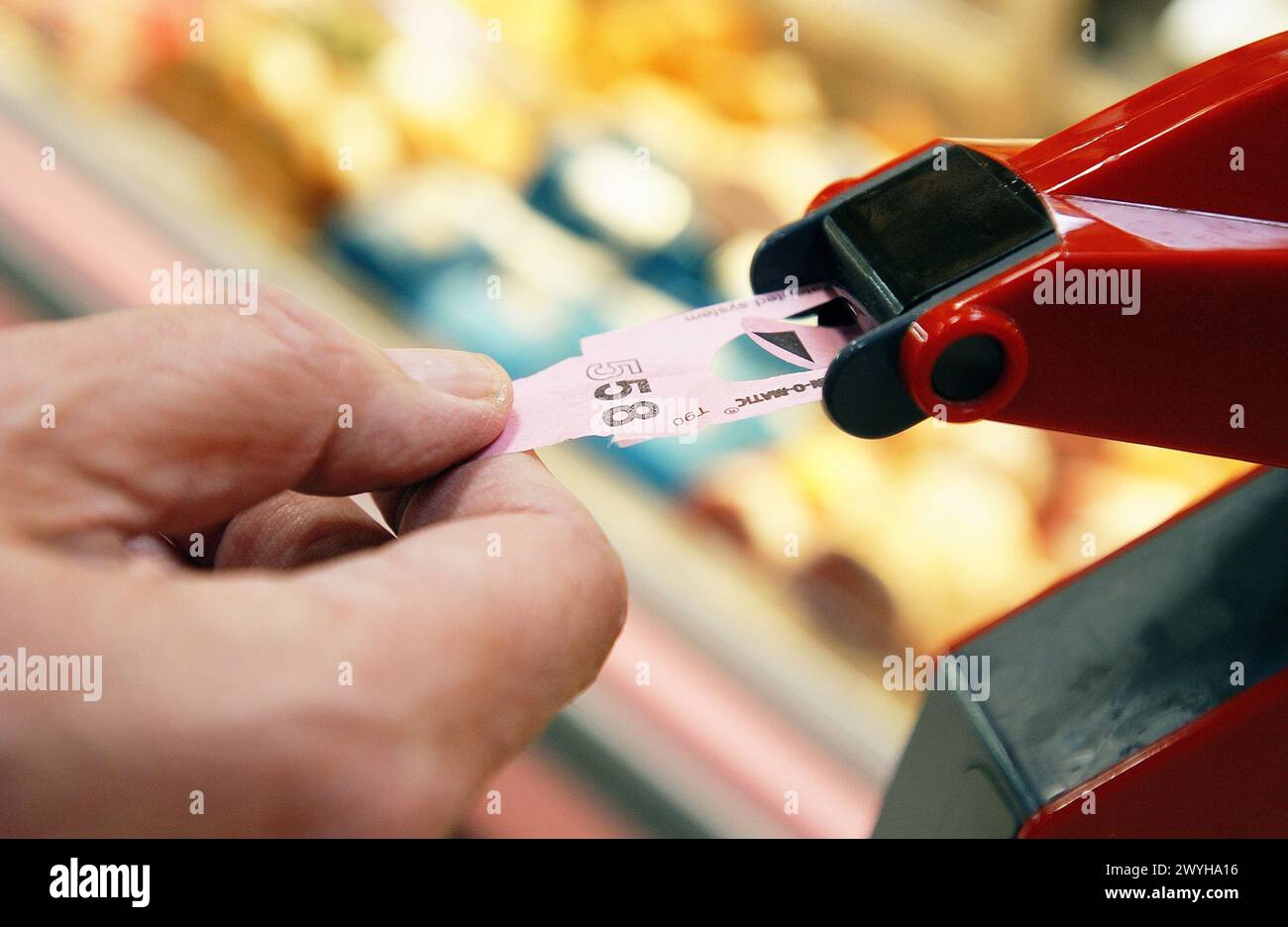 Hypermarket, ticket dispenser Stock Photo - Alamy