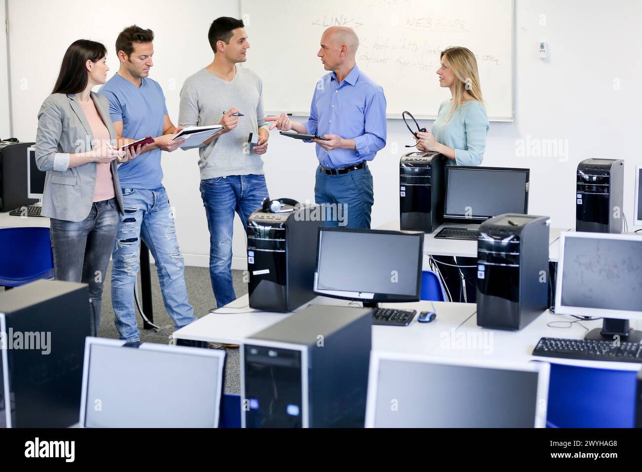 Group of teachers. Computer Academy Stock Photo - Alamy