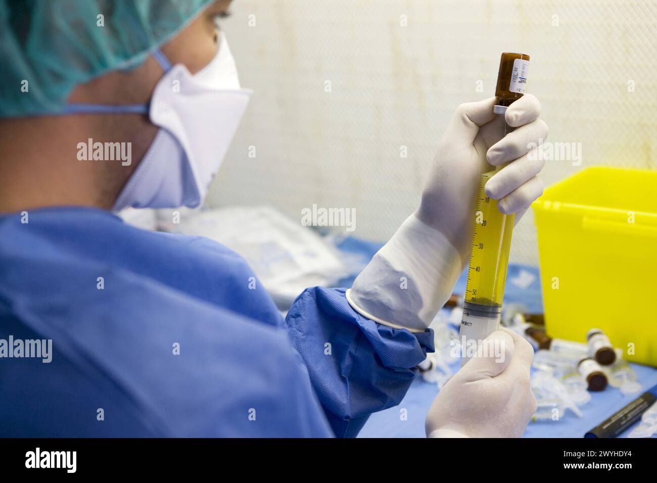 Pharmacy, drug preparation in hood, horizontal laminar flow cabinet ...