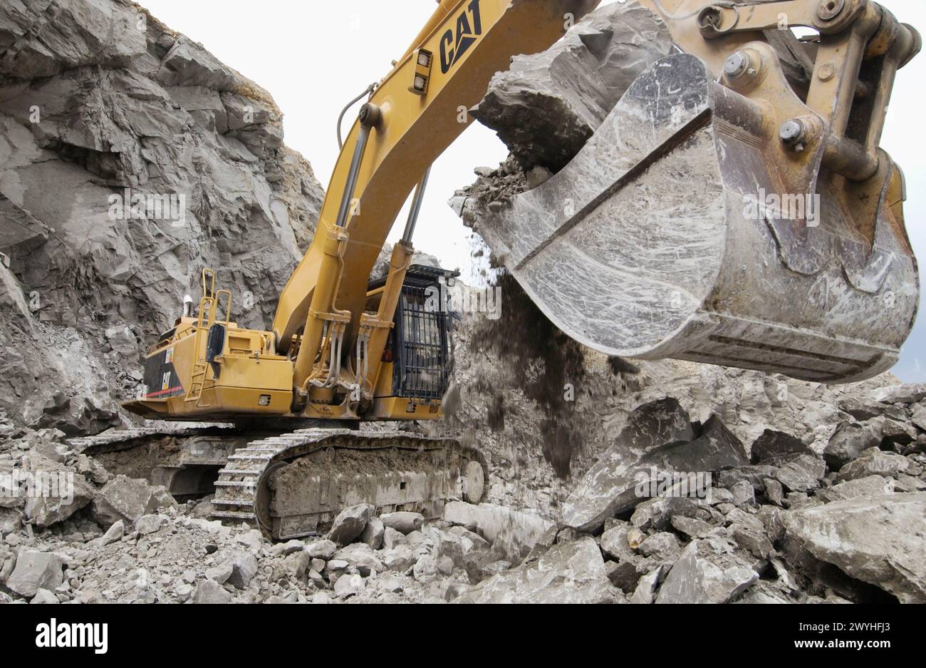 Extracting raw material from quarry for cement manufacturing Stock ...