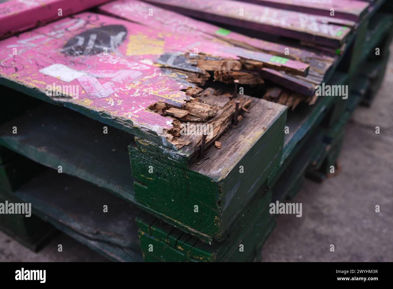 Wooden Pallets. Used wooden pallets stacked upon each other ...