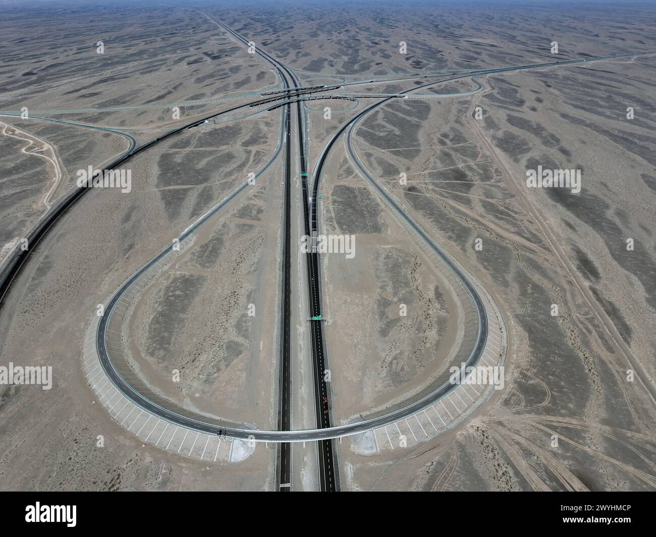 HAMI, CHINA - APRIL 5, 2024 - Aerial photo show the transition point ...