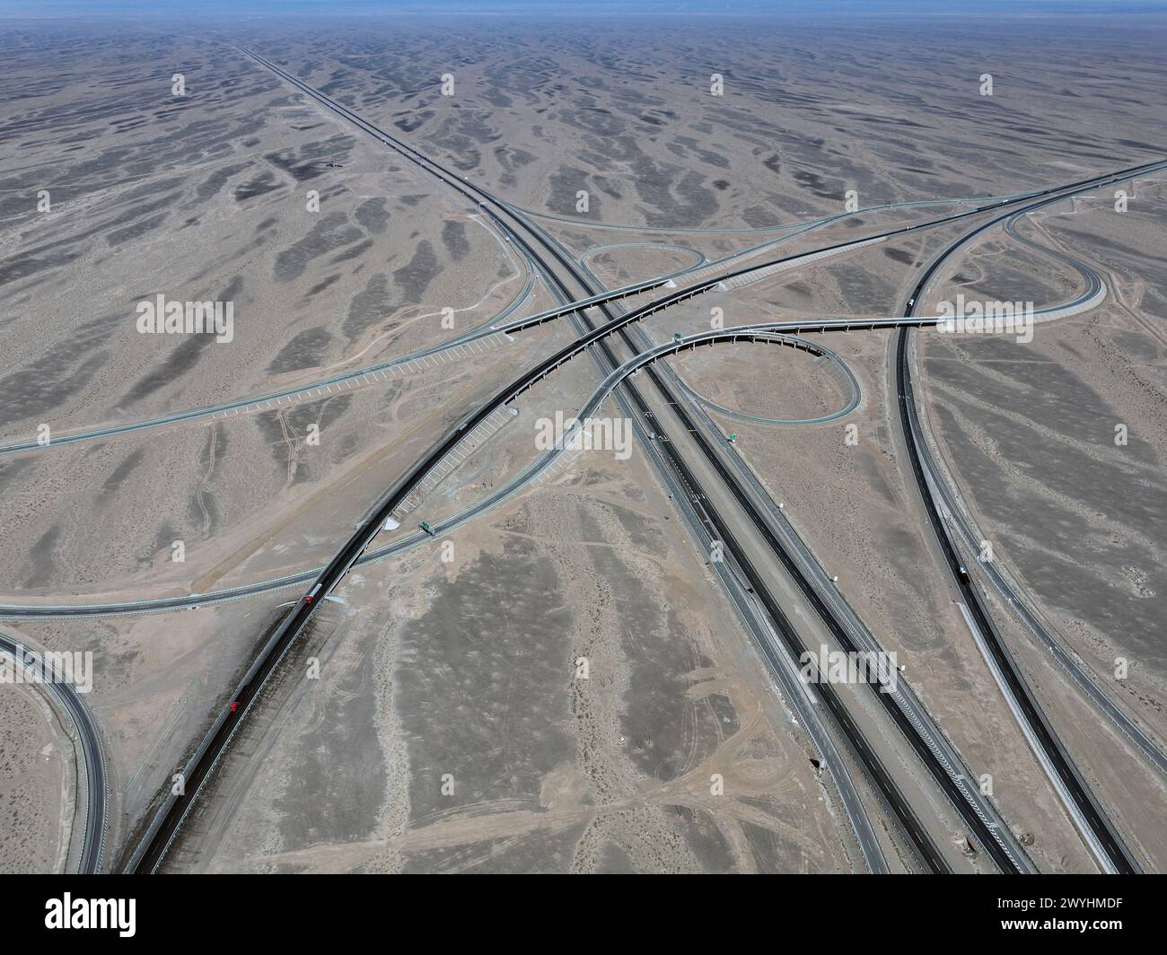 HAMI, CHINA - APRIL 5, 2024 - Aerial photo show the transition point ...