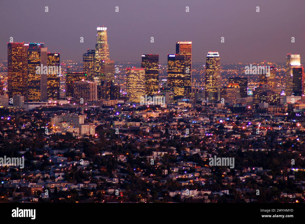 The lights of the Los Angeles skyline are illuminated in the buildings ...