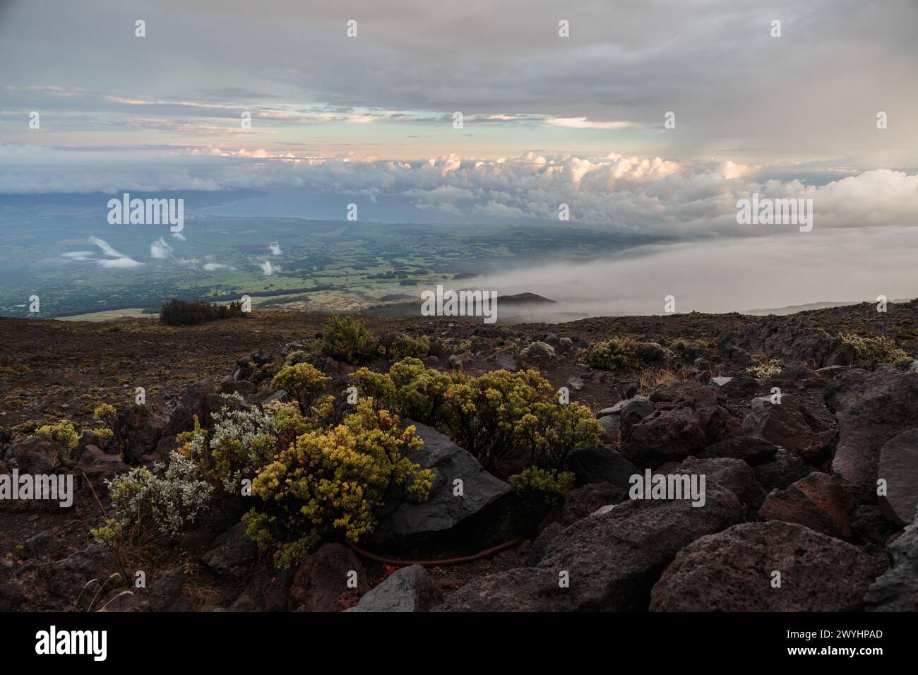 Early morning light and clouds move through the Haleakala volcano ...