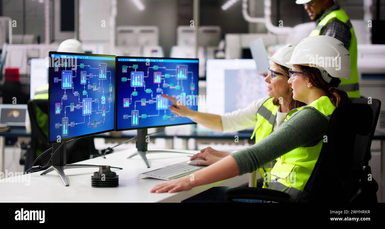Engineer Operators Using Scada System At Industrial Plant Stock Photo - Alamy