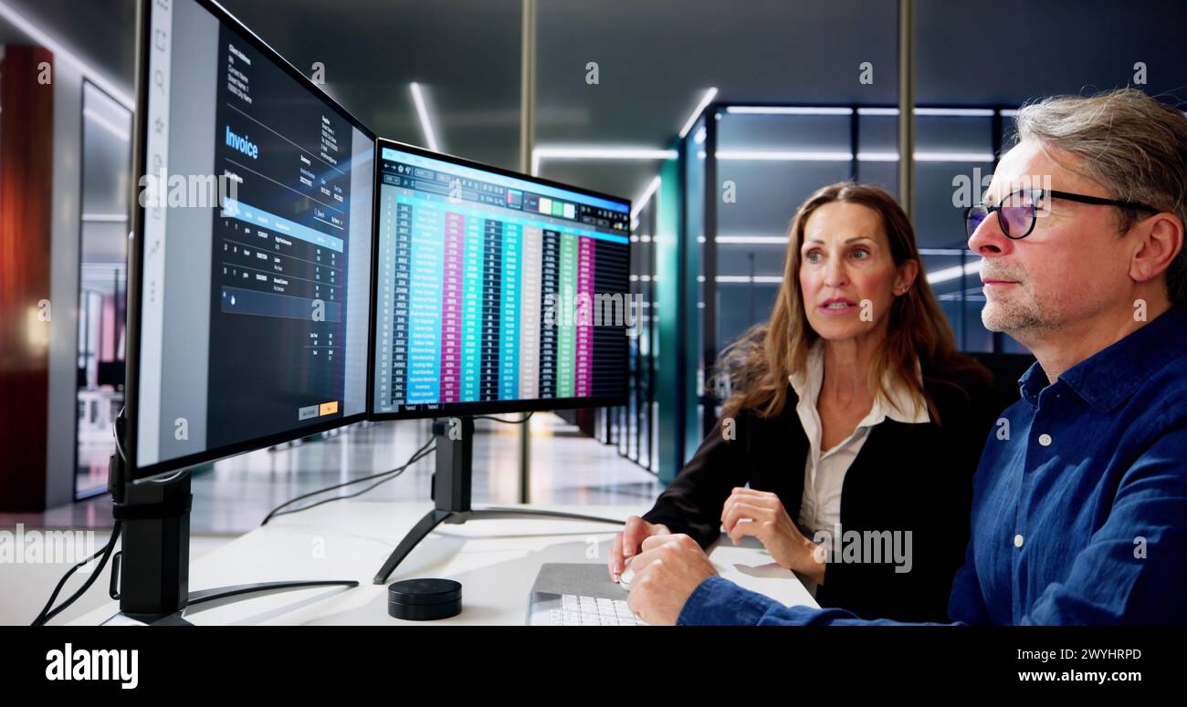 Analyst Employee Working On Spreadsheet Using Desktop Computer Stock ...