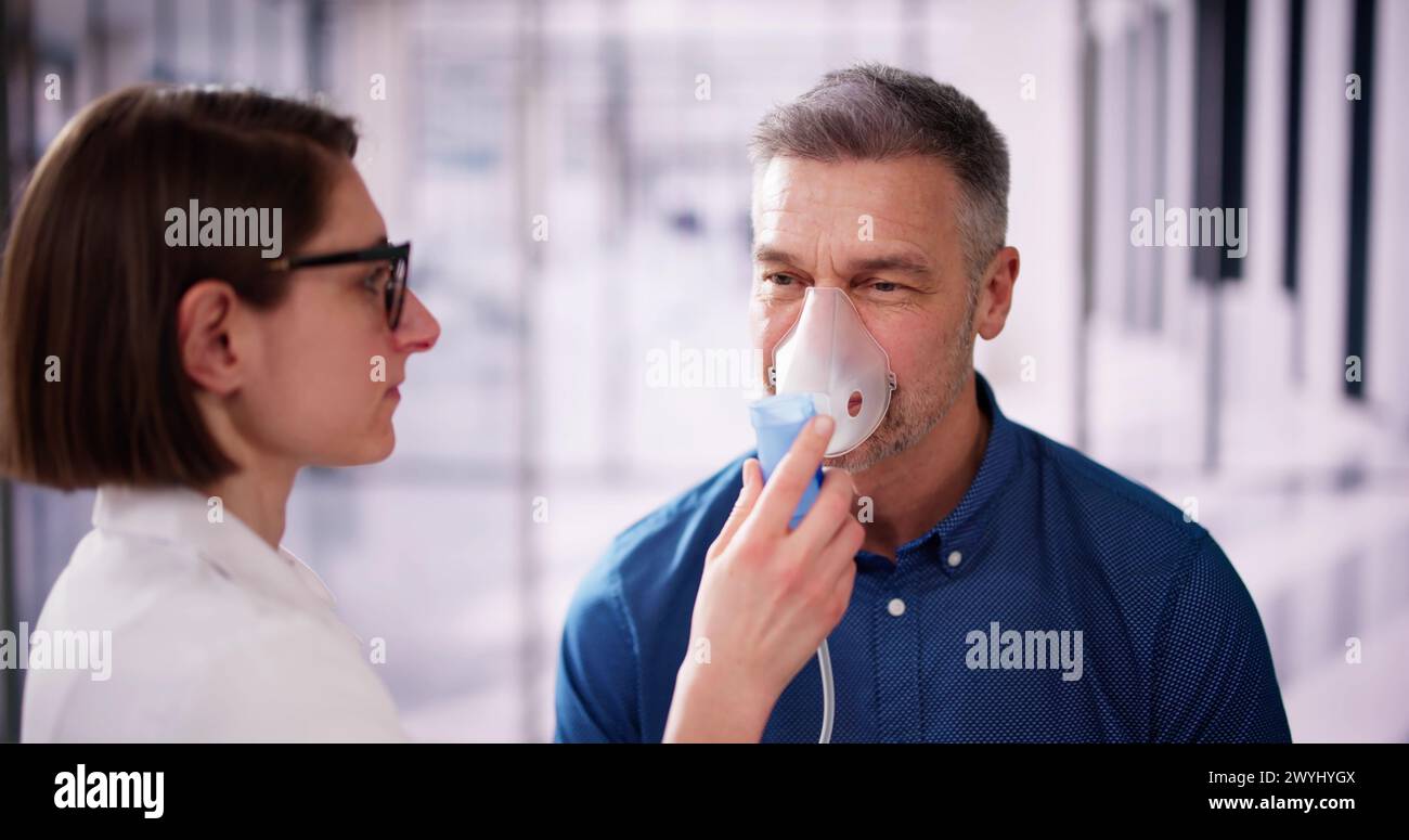 Oxygen Mask For Pulmonary Disease And Fibrosis. Man Inhaling Stock ...