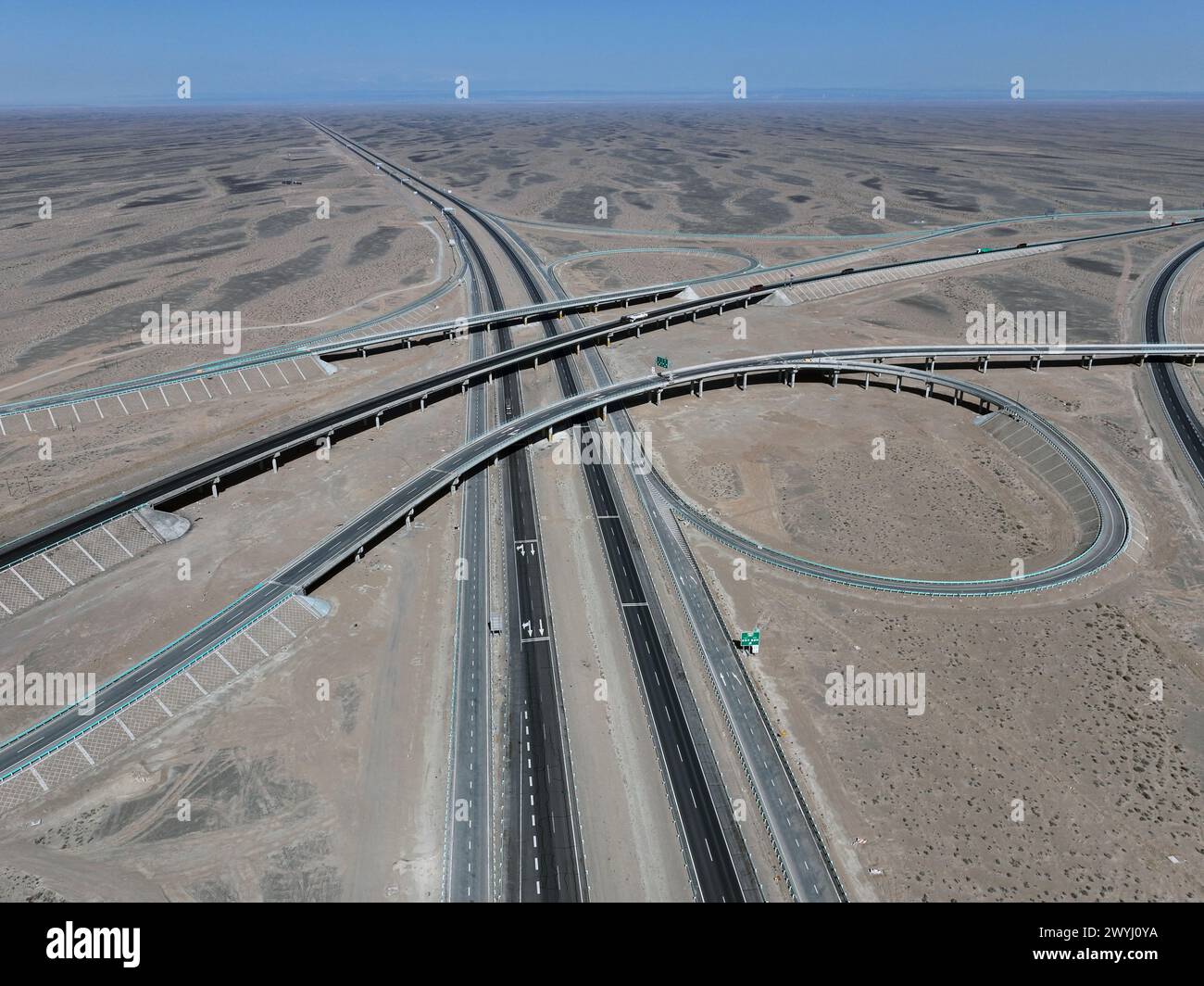 HAMI, CHINA - APRIL 5, 2024 - Aerial photo show the transition point ...