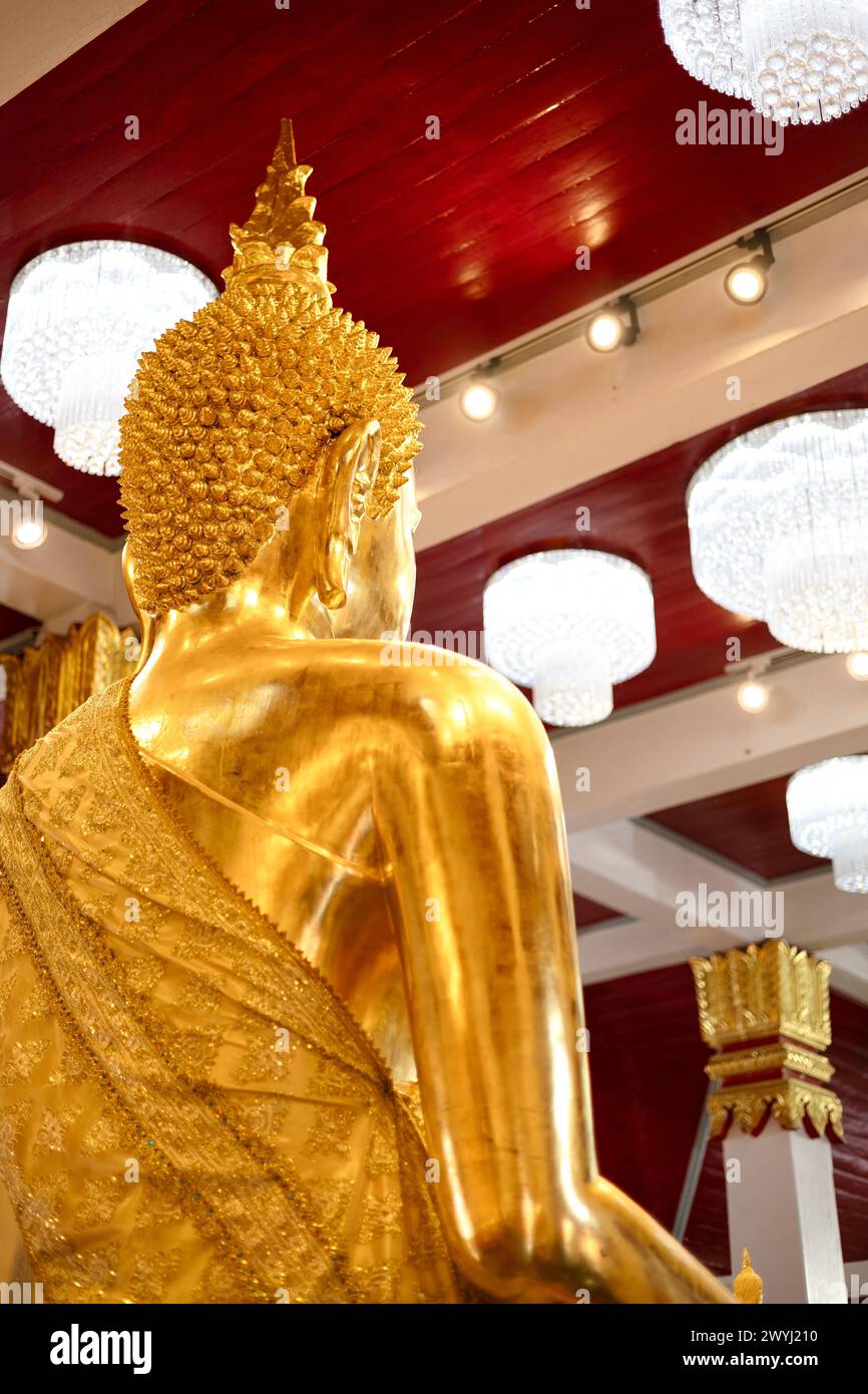 Behind Of Golden Buddha Statue. Golden Buddha behind faces statue ...