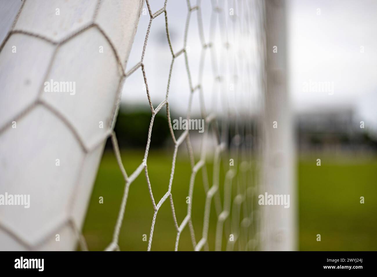 Soccer or football net background. View from behind the goal with ...