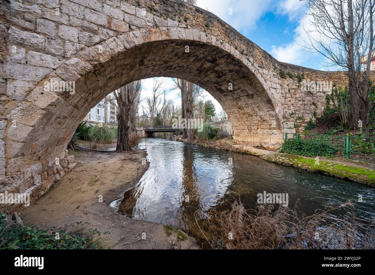 Roman stone bridge over a small stream that crosses the city of Aranda ...