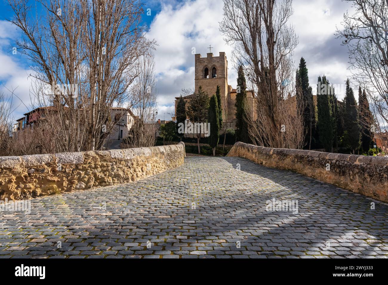 Stone causeway of a Roman bridge leading to the historic centre of ...