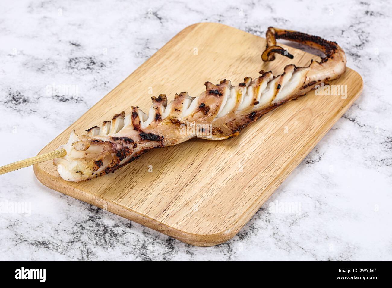 Delicous tasty Grilled octopus tentacle snack Stock Photo - Alamy