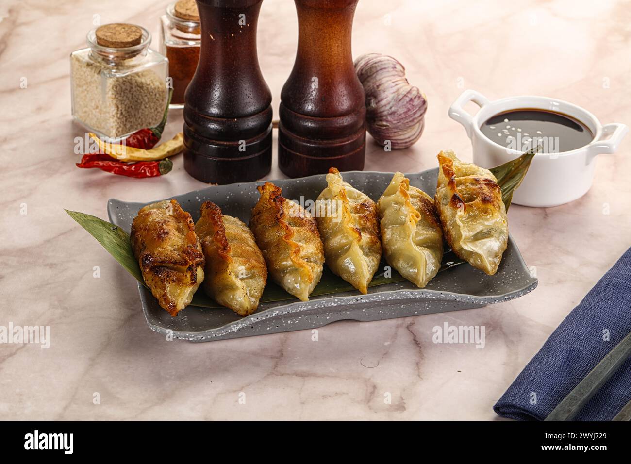 Fried Japanese stuffed dumplings - Gyoza with meat Stock Photo - Alamy
