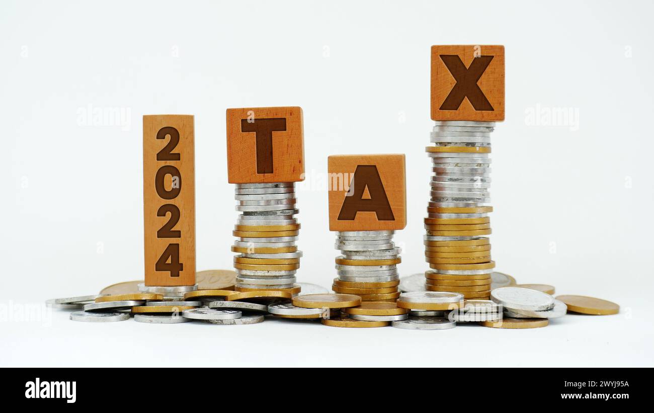 Tax 2024 text on wood. Concept of paying taxes in 2024 Stock Photo - Alamy
