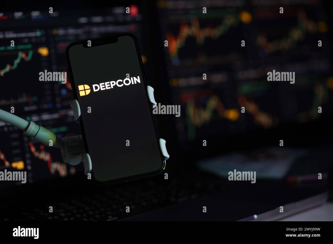 KYIV, UKRAINE - MARCH 15, 2024 Deepcoin logo on iPhone display screen ...