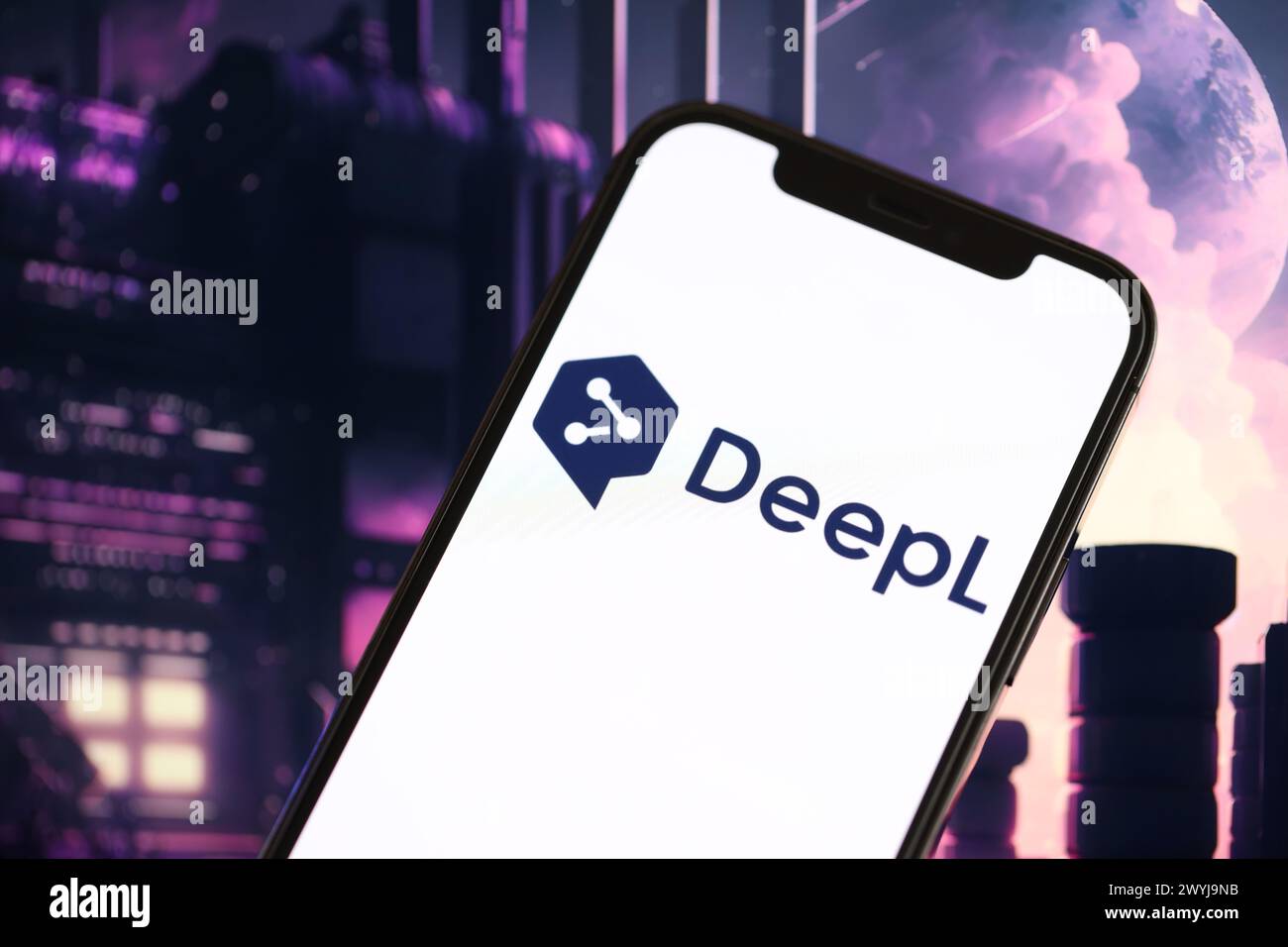 KYIV, UKRAINE - MARCH 17, 2024 DeepL logo on iPhone display screen with background of artificial ...