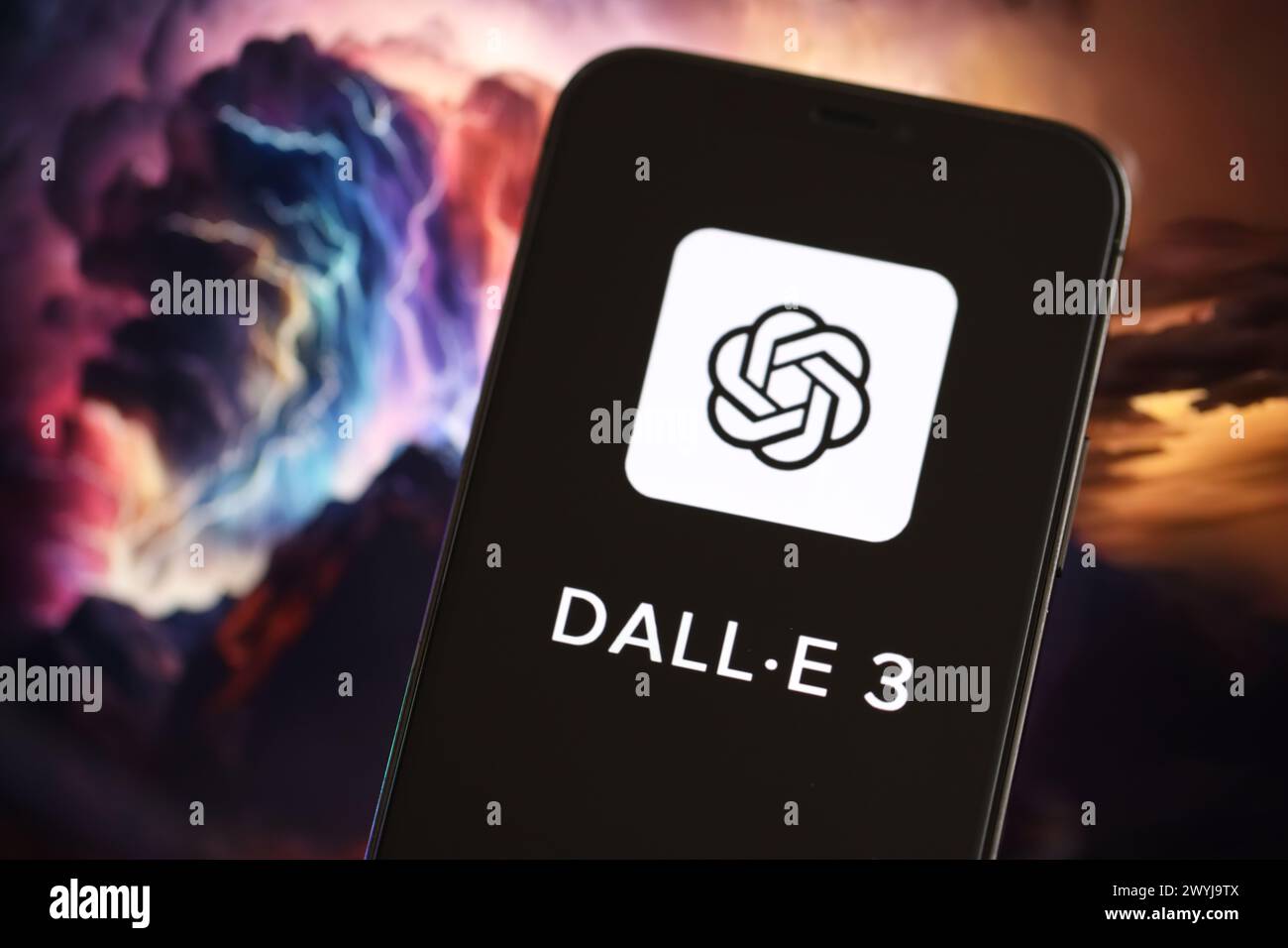 KYIV, UKRAINE - MARCH 17, 2024 Dall-E 3 logo on iPhone display screen with background of ...