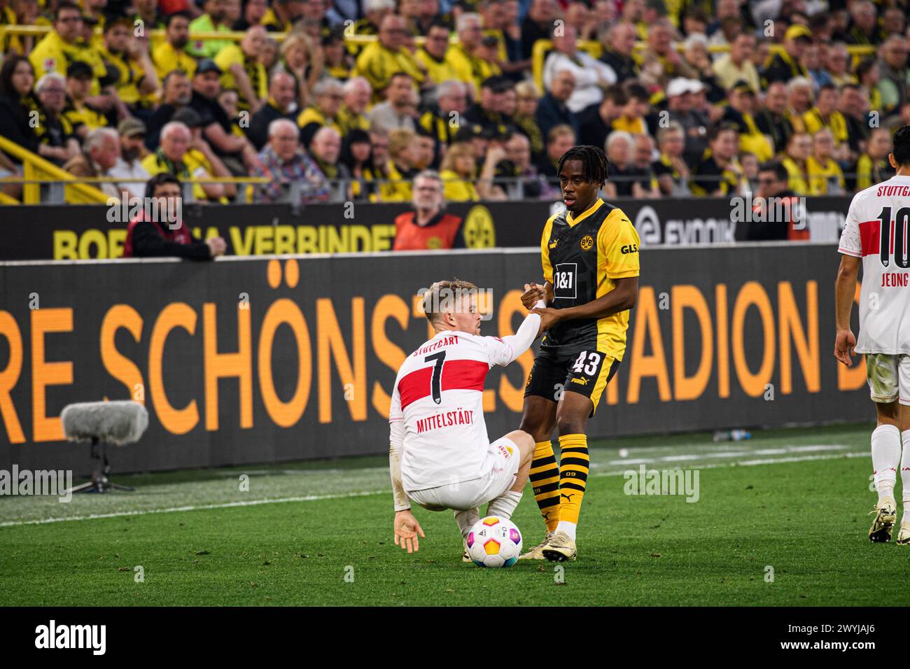 DORTMUND, GERMANY - 6 APRIL, 2024: Maximilian Mittelstaedt, Jamie Bynoe ...
