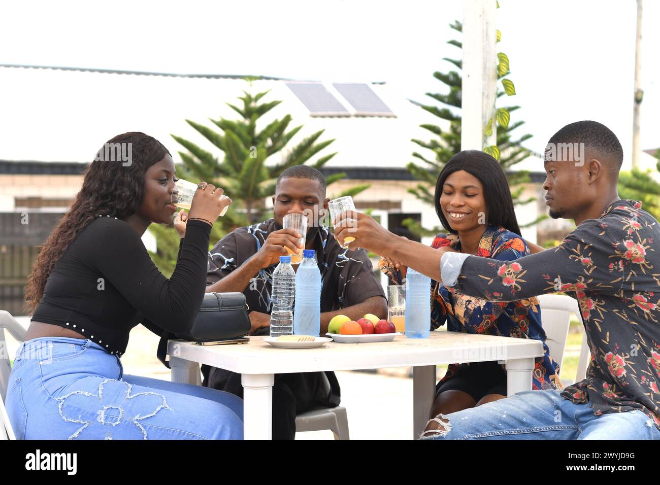 Nigeria young people drinking hi-res stock photography and images - Alamy