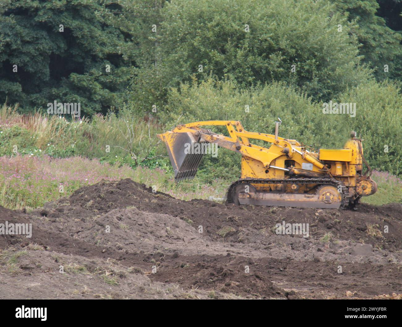 A Vintage Yellow Bulldozer Earth Moving Vehicle Stock Photo - Alamy