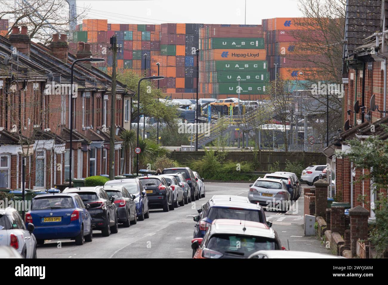 Shipping Containers stacked at the end of a terraced street in ...