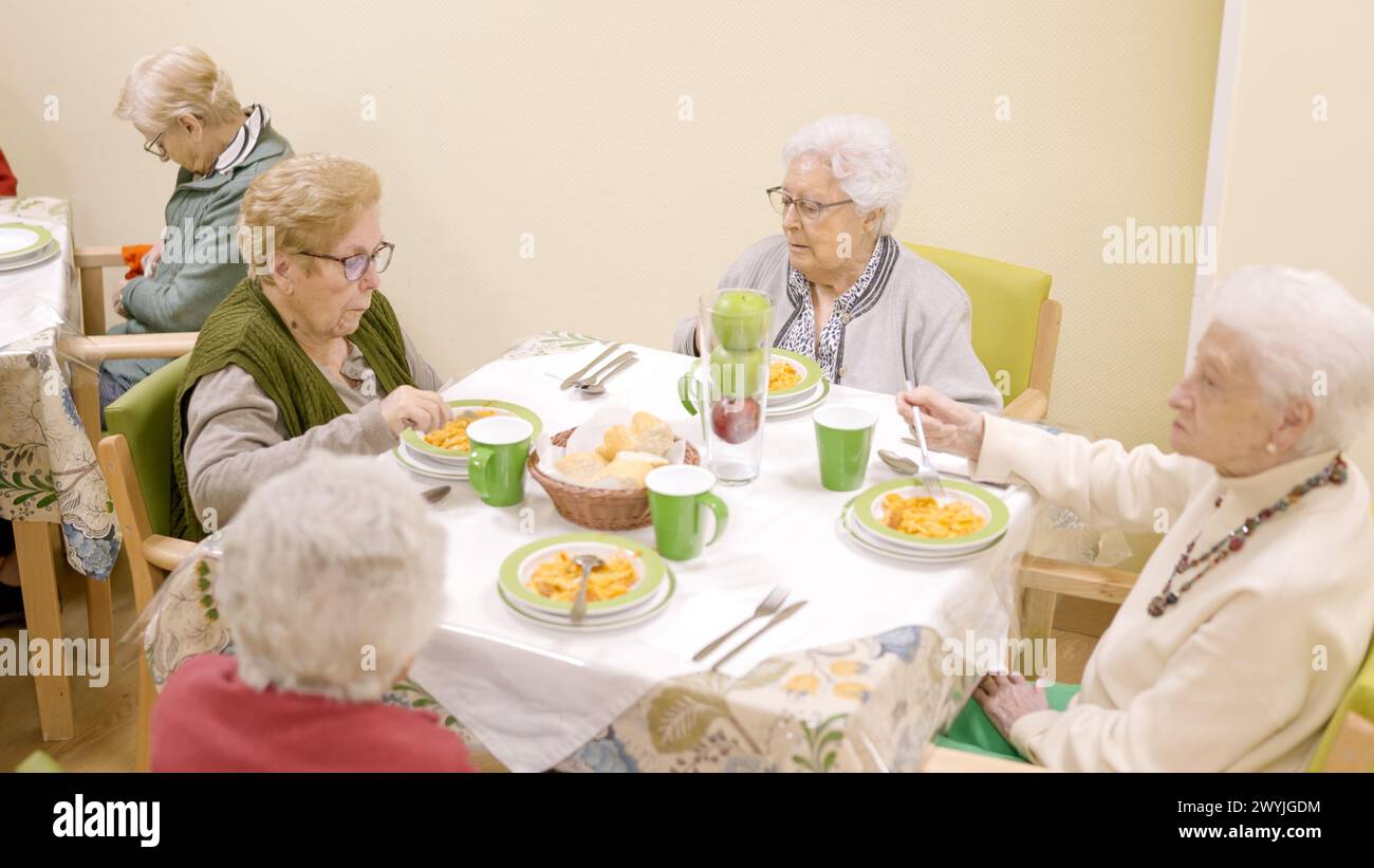 Top view of people eating in a nursing home Stock Photo - Alamy