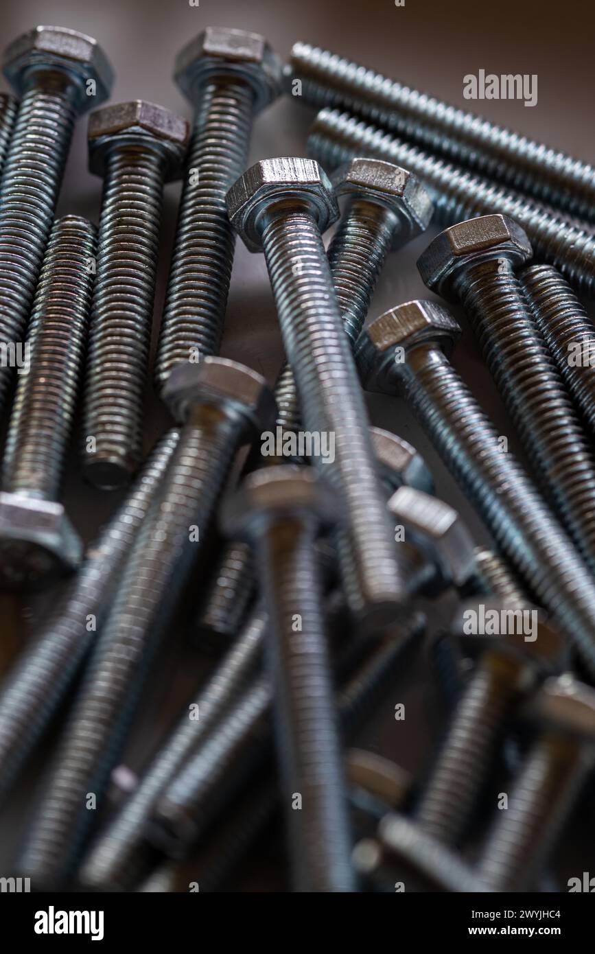 Close-up of many long silver screws Stock Photo - Alamy