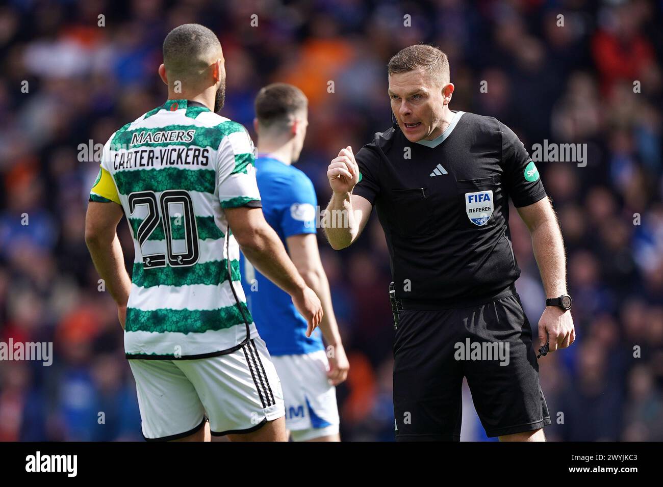 Celtic’s Cameron Carter-Vickers (left) is warned by match referee John ...