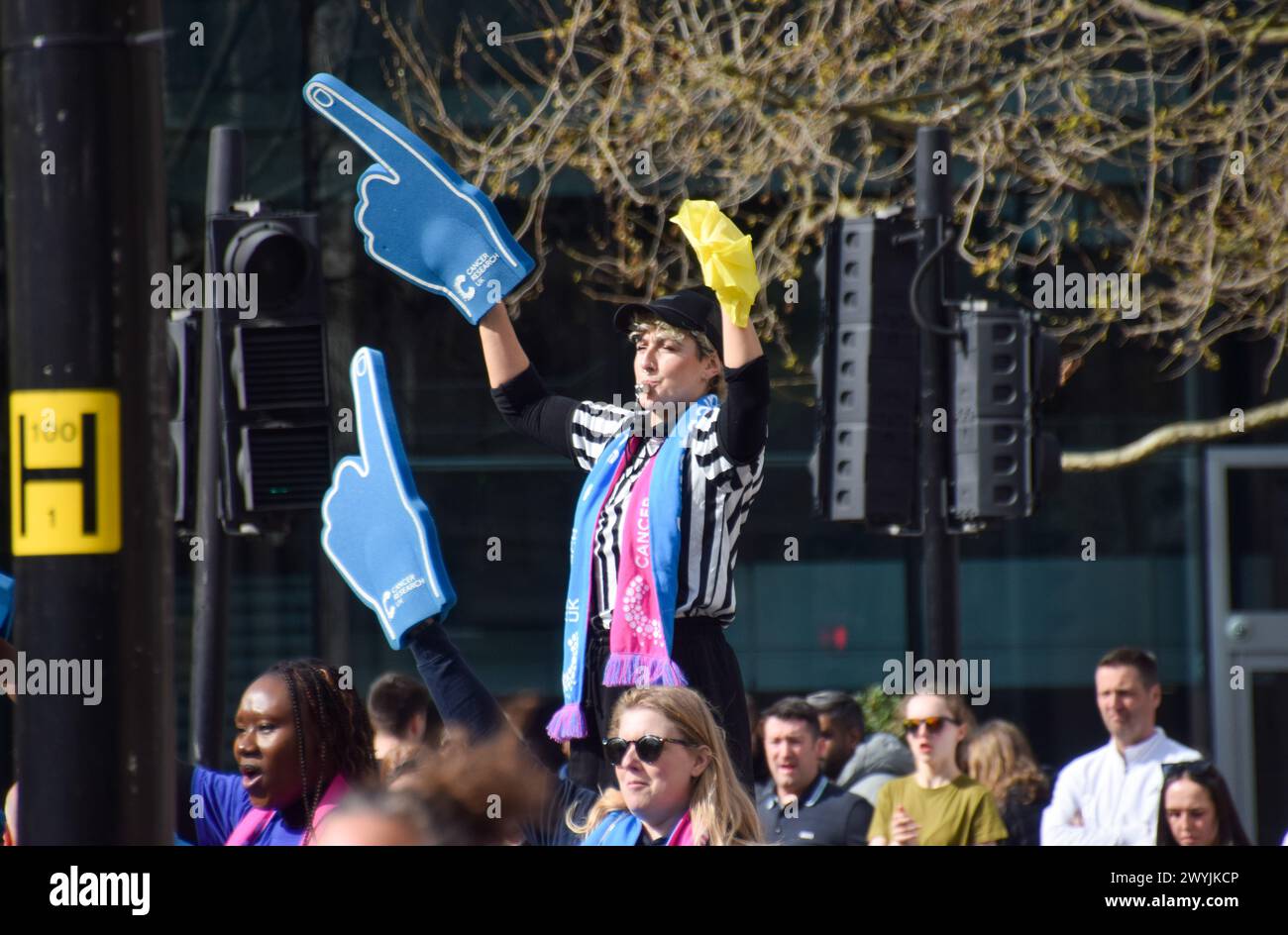 London, England, UK. 7th Apr, 2024. The cheering section as runners ...