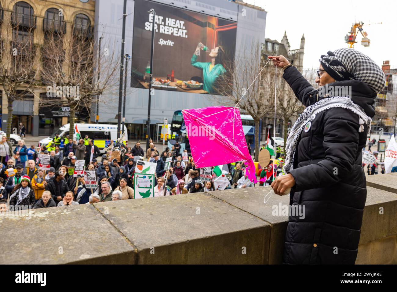 Leeds, UK. 06 APR, 2024. Pro Palestine demonstrator waves a pink kite ...