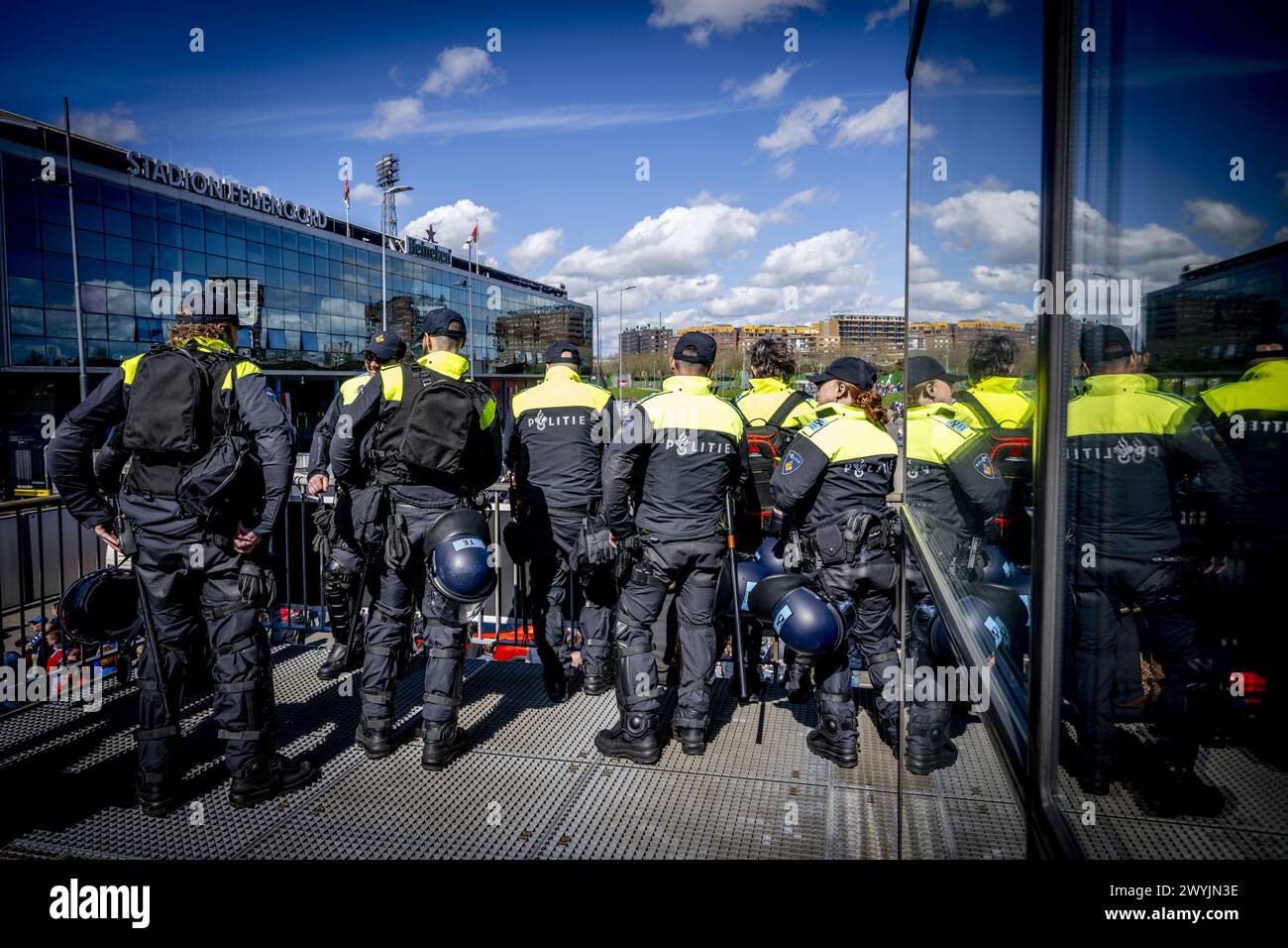 ROTTERDAM - Police officers keep an eye on De Kuip stadium prior to the ...